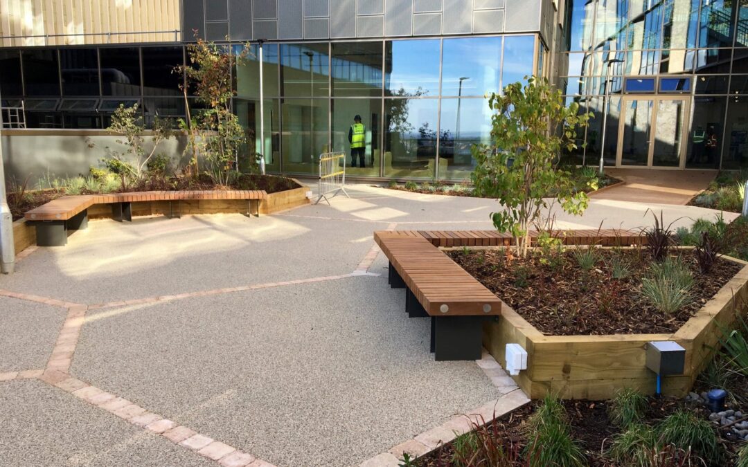 Hardwood benches for Exeter university from Benchmark street furniture ...